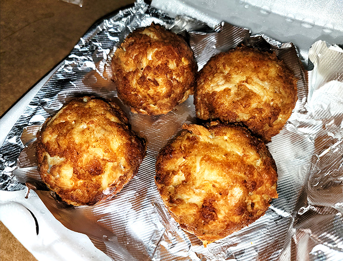 Golden-brown perfection that would make Neptune himself weep. These crab cakes are what seafood dreams are made of&mdash;mostly crab, minimal filler.