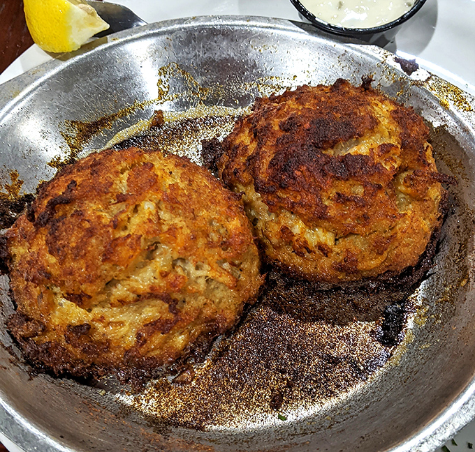 Golden perfection on a plate - these crab cakes could make a Baltimorean weep with joy.