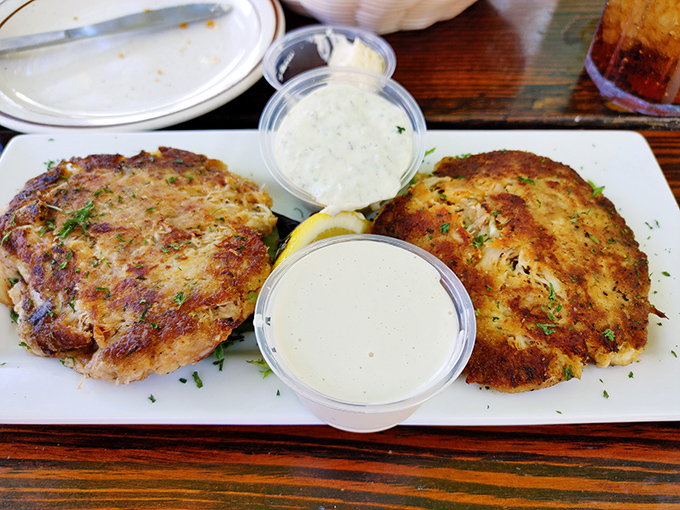 These golden-brown beauties aren't just crab cakes &ndash; they're edible proof that sometimes the simplest pleasures are the most profound.