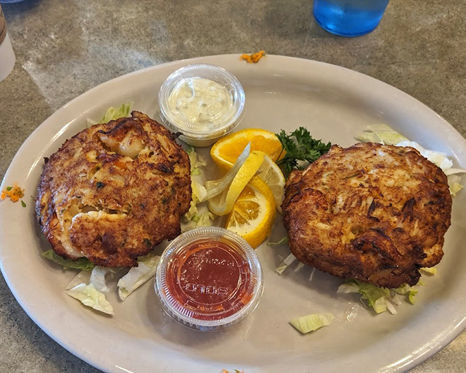 Behold the stars of our show: crab cakes that could make a Marylander weep with joy. More crab than cake, these golden beauties are what food dreams are made of.