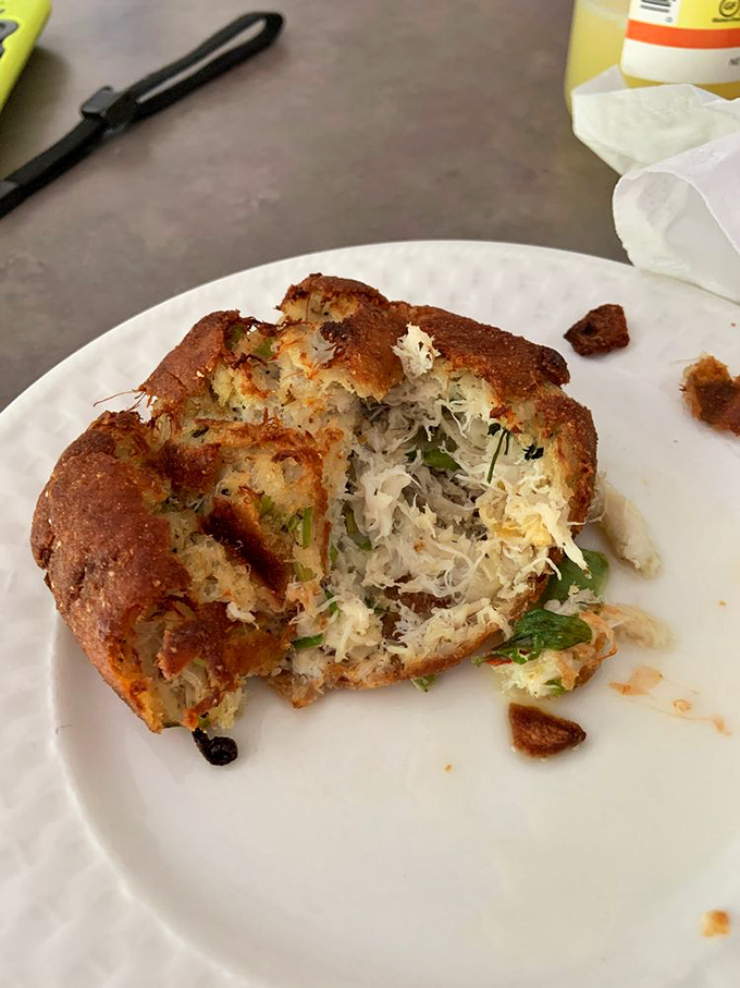 Behold the holy grail of crab cakes – more jumbo lump than binding, it's the seafood equivalent of finding extra fries at the bottom of the bag.