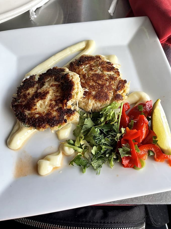 Golden perfection arrives: these legendary crab cakes prove that sometimes the locals really do know best.