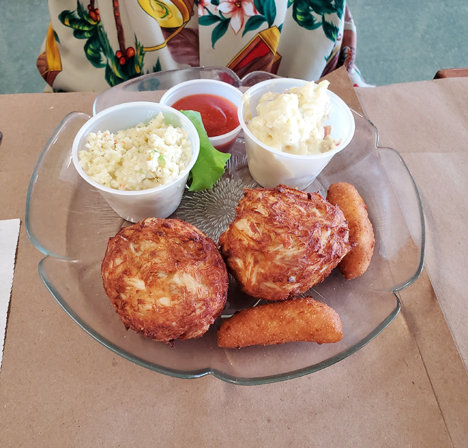 Golden-fried crab cakes that are all meat, no filler &ndash; the way Neptune himself would demand them to be served.