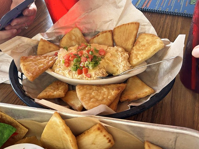 This crab dip with crispy pita triangles isn't just an appetizer; it's the opening act of a seafood symphony that deserves a standing ovation.