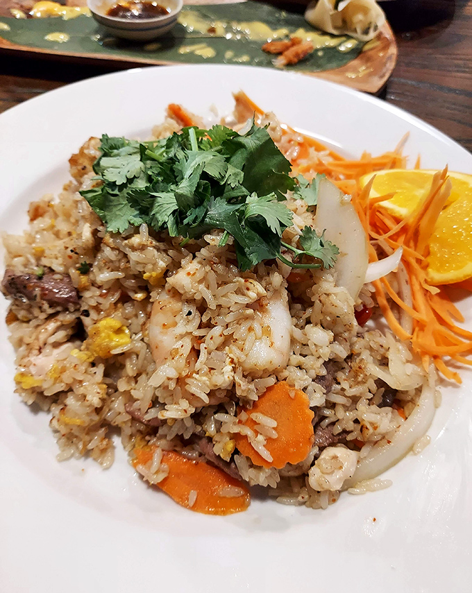 Behold the legendary crab fried rice that turns first-time visitors into lifelong devotees.