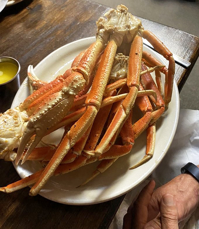 These golden beauties crack open like oceanic treasure chests, revealing sweet meat that validates every coastal craving.