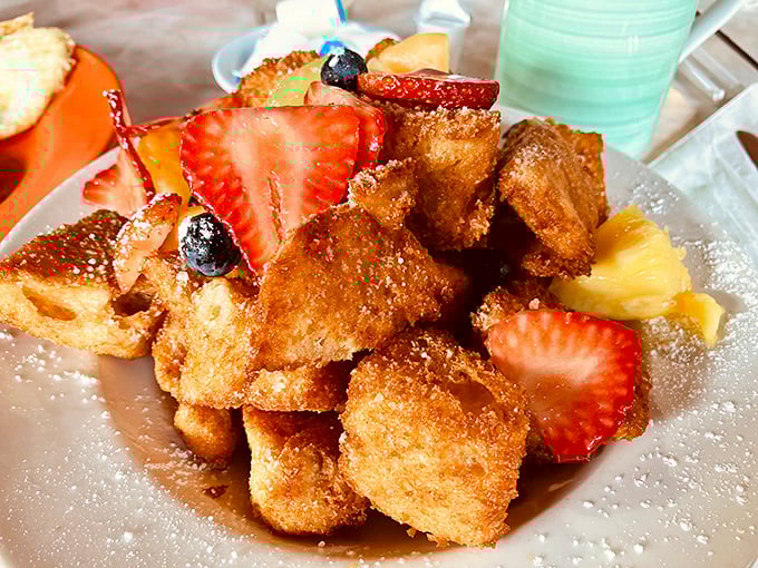 Cuban French Toast that would make your cardiologist wince and your taste buds sing &ndash; golden cubes of homemade bread with fresh fruit that's breakfast's answer to dessert.