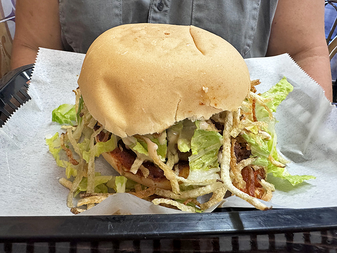 The legendary frita in all its glory&mdash;a Cuban-style burger crowned with crispy potato wisps that make regular fries seem like underachievers.