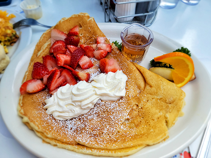 Thin, golden Danish pancakes adorned with fresh strawberries and whipped cream. Breakfast doesn't get more photogenic&mdash;or delicious&mdash;than this masterpiece.