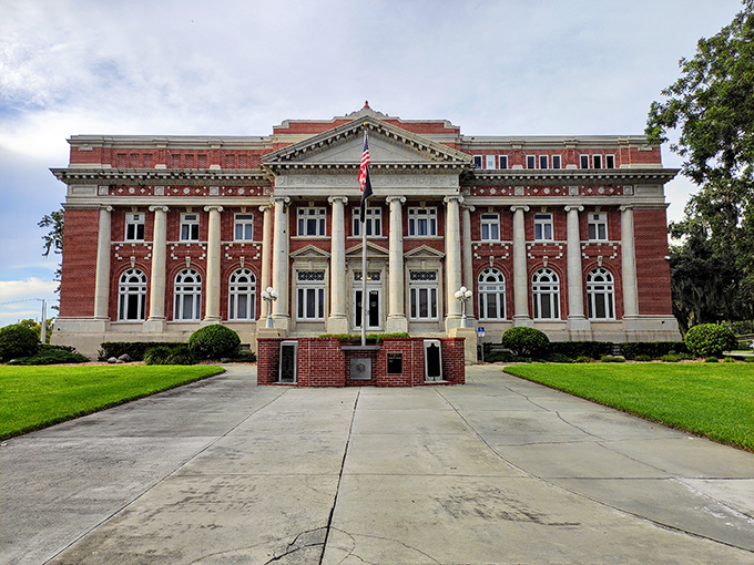 The majestic DeSoto County Courthouse stands as a red-brick testament to an era when public buildings were designed to inspire, not just function. 