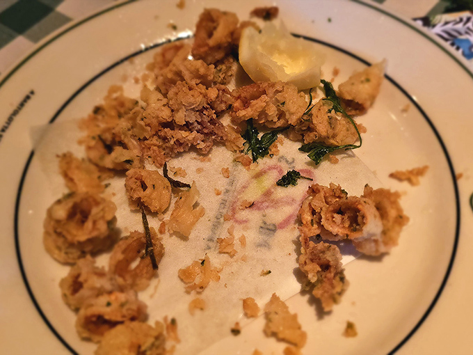 Golden-fried calamari that shatters with each bite, revealing tender squid beneath. This isn't bar food&mdash;it's an edible love letter.