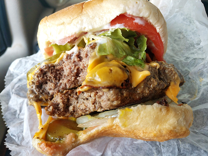 This isn't just a cheeseburger&mdash;it's edible proof that perfection doesn't need reinvention. Note that cascade of melted cheese embracing the patty.