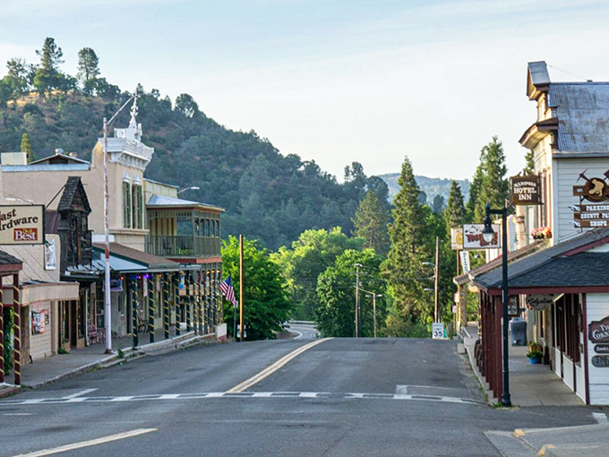 Downtown Mariposa at dusk, when the Sierra foothills create a perfect backdrop and the only traffic jam involves deciding which restaurant deserves your patronage tonight.