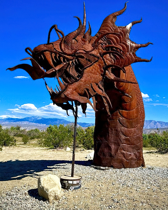 Up close, the dragon's intricate metalwork reveals the artist's extraordinary attention to detail&mdash;each scale and spine a testament to human creativity in this desolate landscape.