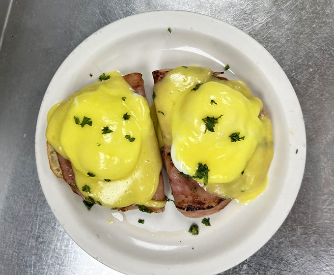 Behold the star attraction: Eggs Benedict with hollandaise so vibrant it could moonlight as sunshine. Worth setting your alarm for.