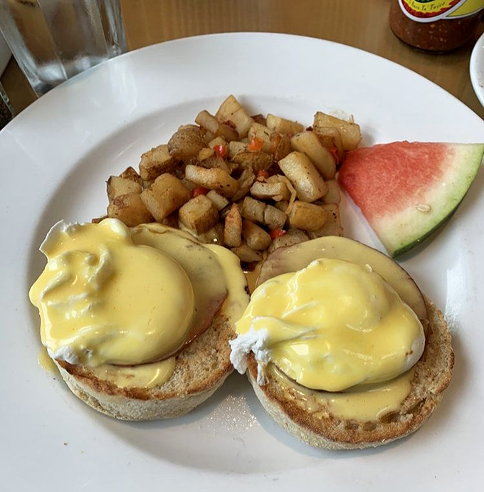 Behold, the star of our show! These Eggs Benedict with their cascading hollandaise are what breakfast dreams—and return visits—are made of.