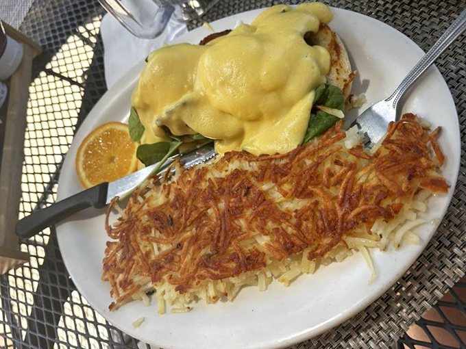 This Eggs Benedict isn't just breakfast&mdash;it's architecture. Those crispy hash browns could qualify as their own zip code.