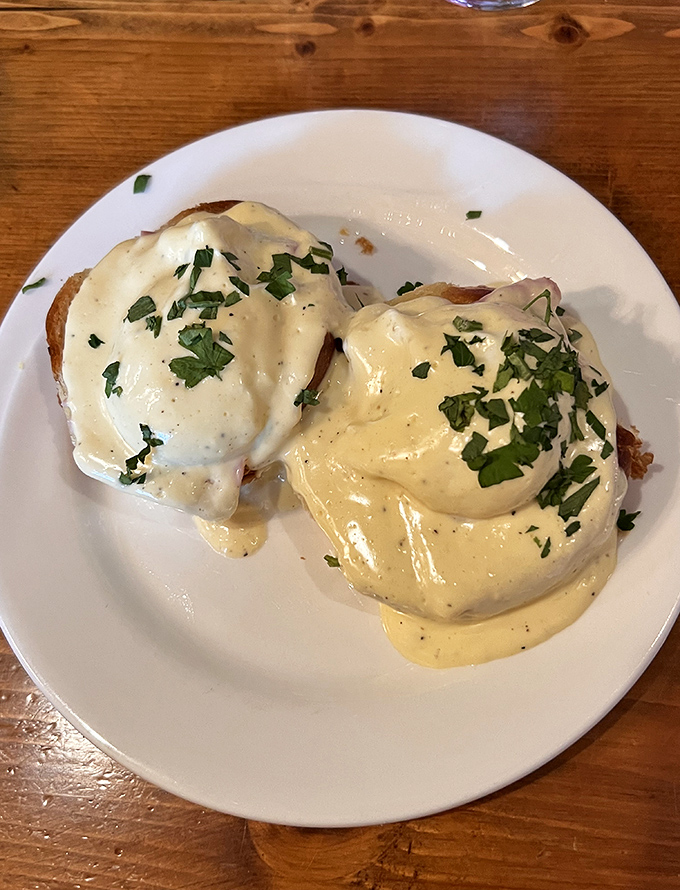 Behold the holy grail of breakfast: two perfectly poached eggs draped in hollandaise that's silky enough to make a French chef weep with joy.