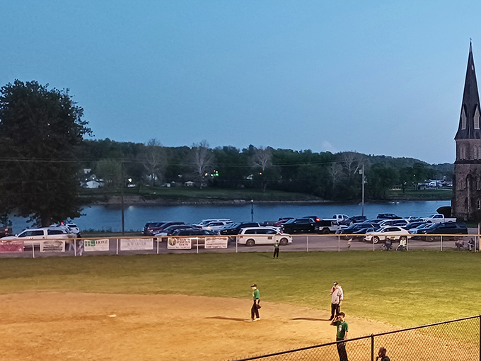 Twilight baseball with the river as backdrop &ndash; small-town America doesn't get more authentic than this magical summer evening scene.