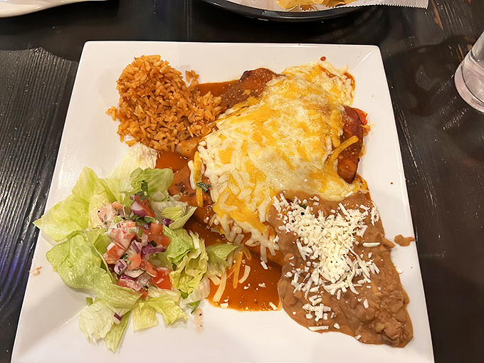 This isn't just an enchilada&mdash;it's a masterclass in sauce-to-cheese ratio, with rice that actually deserves its place on the plate.