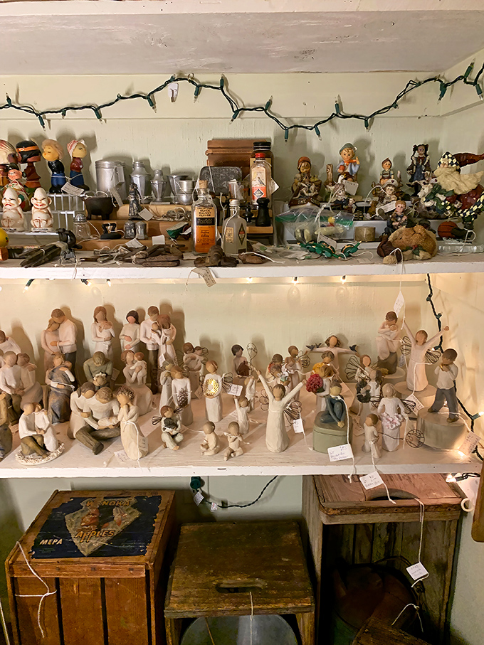 Shelf after shelf of figurines stand in silent judgment, like a tiny porcelain audience waiting for you to explain why you need another collectible.