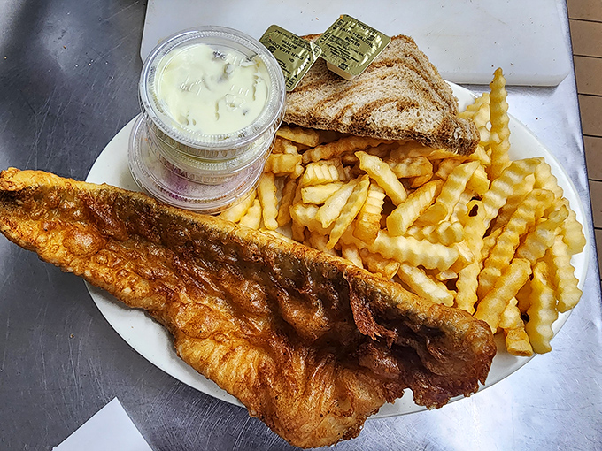 Golden-battered perfection that shatters with each bite. This isn't just fish fry &ndash; it's Wisconsin's Friday night religion on a plate.