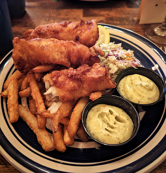 Golden-battered fish that shatters with each bite, creamy coleslaw, and two kinds of dipping sauce &ndash; this is Wisconsin's Friday night religion on a plate.