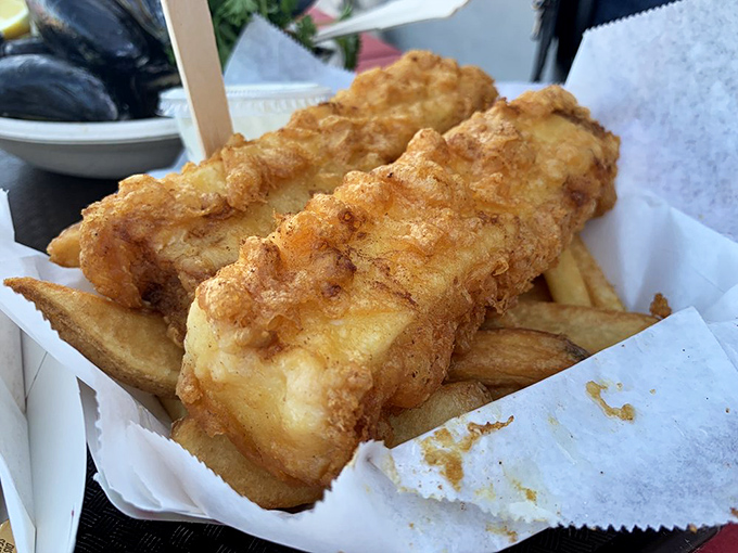 Golden, crispy perfection that makes British expats weep with joy. This fish and chips doesn't need a passport to transport you across the Atlantic.