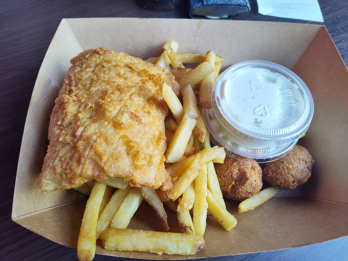 Golden-battered whitefish that shatters with each bite, paired with perfectly crisp fries. This isn't fast food; it's good food, fast.