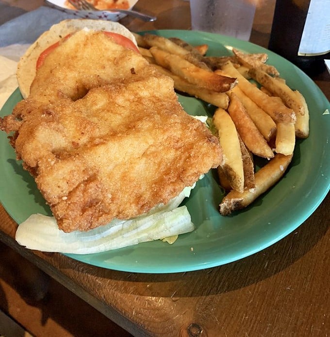 Golden, crispy perfection meets flaky white fish. This is what fish and chips dreams are made of, Florida-style.