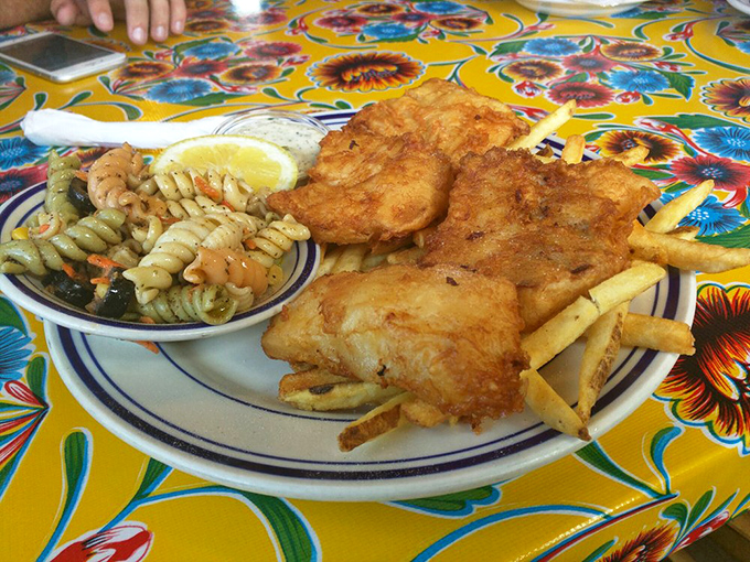 Golden-battered fish that shatters with each bite, paired with pasta salad that didn't come from a plastic tub. This is coastal Oregon on a plate.
