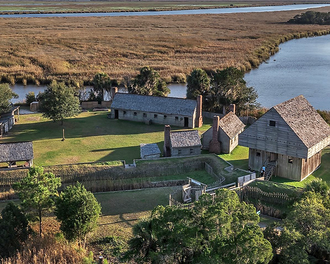 Fort King George's reconstructed buildings transport you to colonial times, when British soldiers likely complained about Georgia humidity while scanning the horizon for Spanish ships.