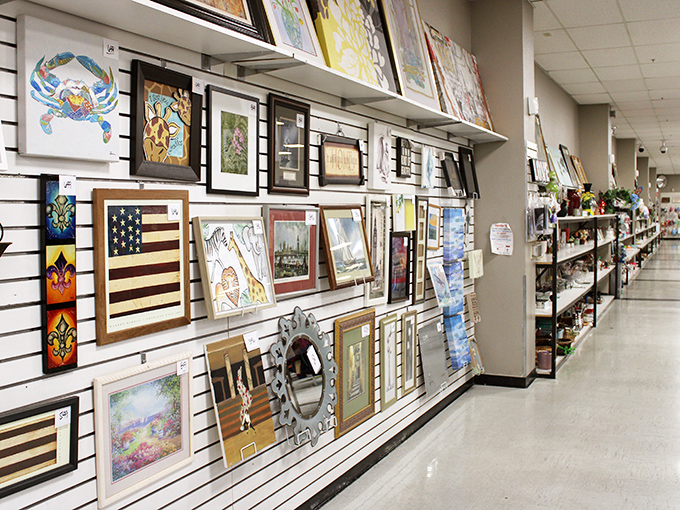 Wall-to-wall artwork where someone's discarded painting becomes another's conversation piece. That crab illustration is calling my name!
