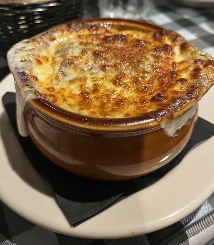 Behold the golden-crowned masterpiece that puts all other French onion soups to shame with its bubbling perfection.
