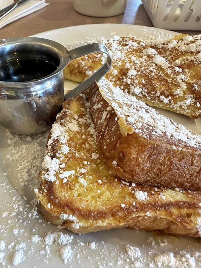French toast that doesn't just whisper "good morning"&mdash;it belts out a full Broadway number complete with powdered sugar snow.