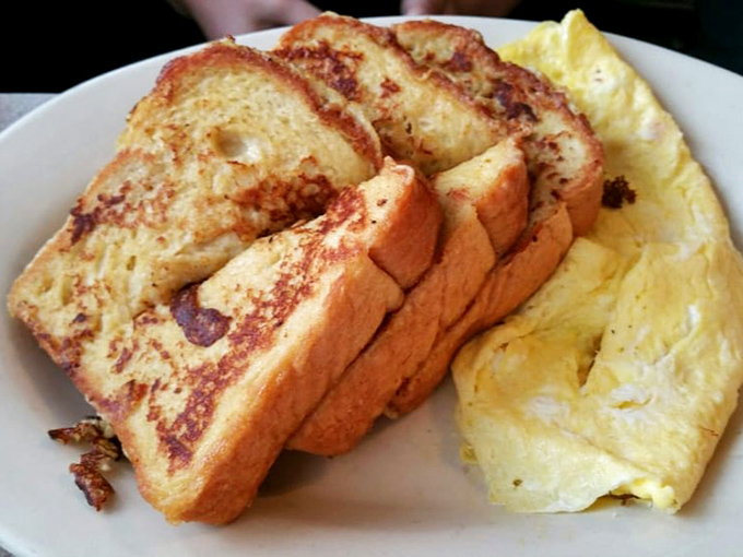 Golden-brown perfection on a plate. This French toast has that magical crisp exterior and custardy interior that breakfast dreams are made of.