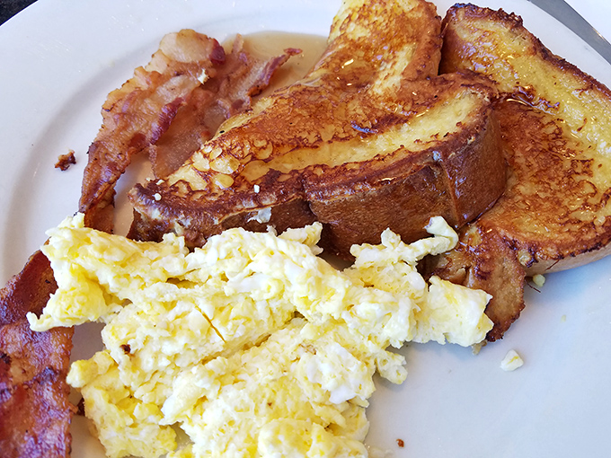 Golden perfection on a plate - French toast that transforms ordinary mornings into celebrations.
