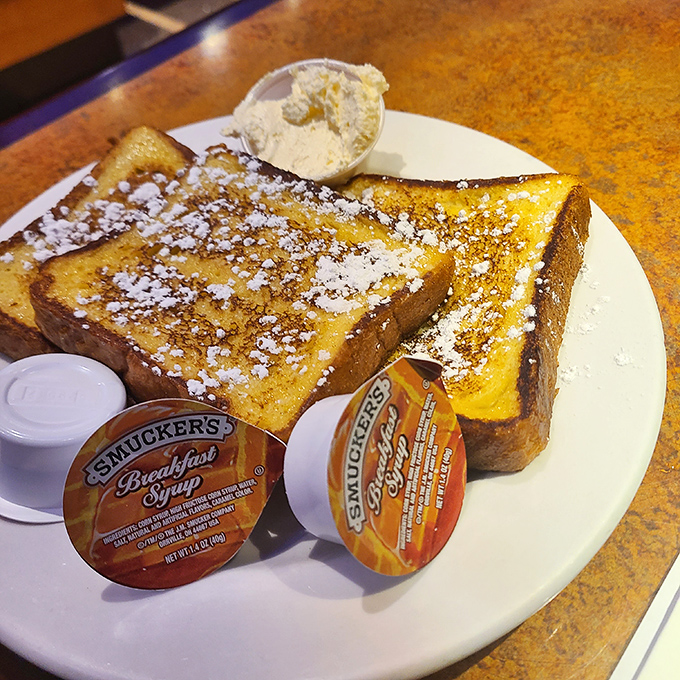Golden-brown French toast dusted with powdered sugar &ndash; the breakfast equivalent of finding out your favorite band is playing in your backyard.