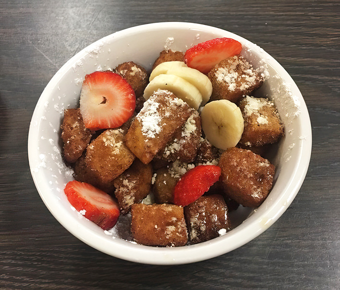 These French toast bites aren't just breakfast&mdash;they're little cubes of joy dusted with powdered sugar and crowned with fresh fruit.