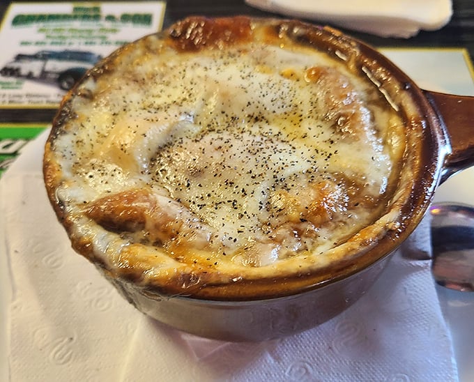 This isn't just French onion soup&mdash;it's a bubbling cauldron of melted cheese paradise that would make even the most sophisticated Parisian weep with joy.