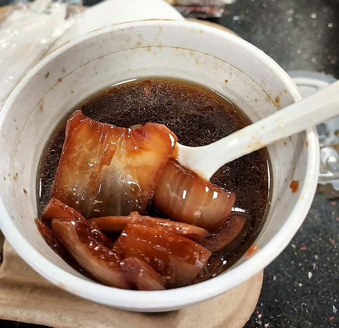 The legendary French onion soup in all its glory &ndash; tender onions swimming in a broth so rich it could apply for a loan.