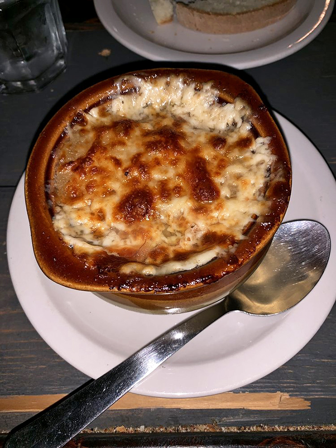 Behold the French onion soup in all its glory&mdash;a bubbling cauldron of cheese-capped perfection that makes you want to break into song.