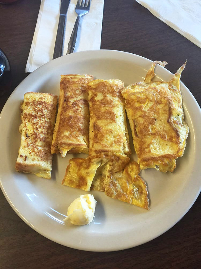 Golden-brown French toast that's crispy outside, custardy inside. This isn't just breakfast&mdash;it's the reason alarm clocks were invented.