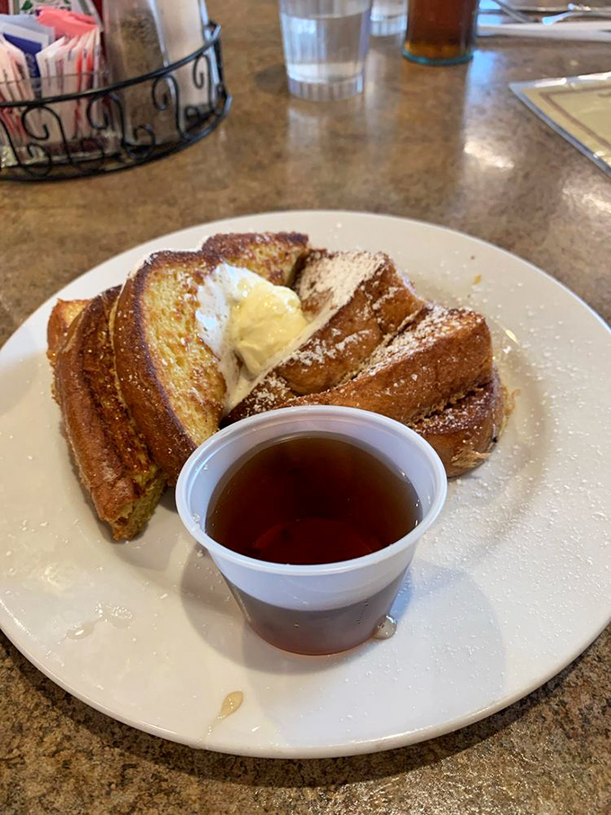 Golden-brown French toast dusted with powdered sugar &ndash; the breakfast equivalent of finding an extra $20 in your pocket. 