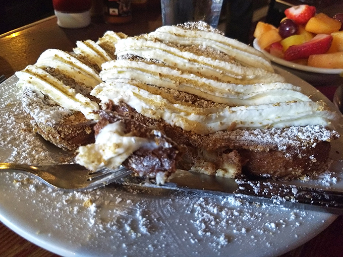 French toast that's dressed for the red carpet &ndash; layers of decadence topped with enough cream to make a dairy farmer blush.