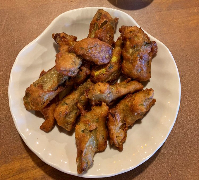 Golden-brown perfection on a plate. These deep-fried artichoke hearts are what food dreams are made of&mdash;crispy exterior, tender interior, pure California bliss.