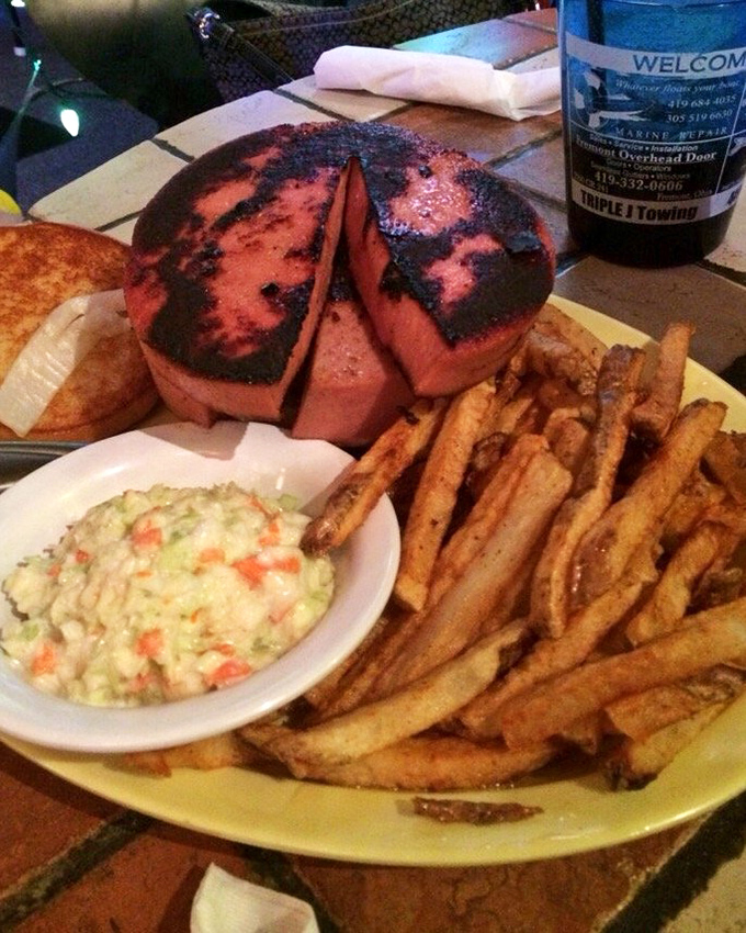 That's not just a fried bologna sandwich—it's childhood nostalgia that grew up, went to culinary school, and came back to show off.