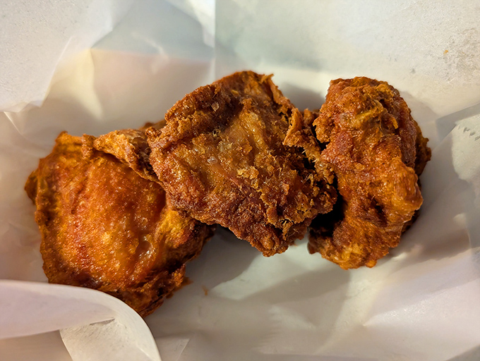 Golden-brown perfection that makes you want to forget your table manners. That crust is the stuff of crispy, spicy dreams.