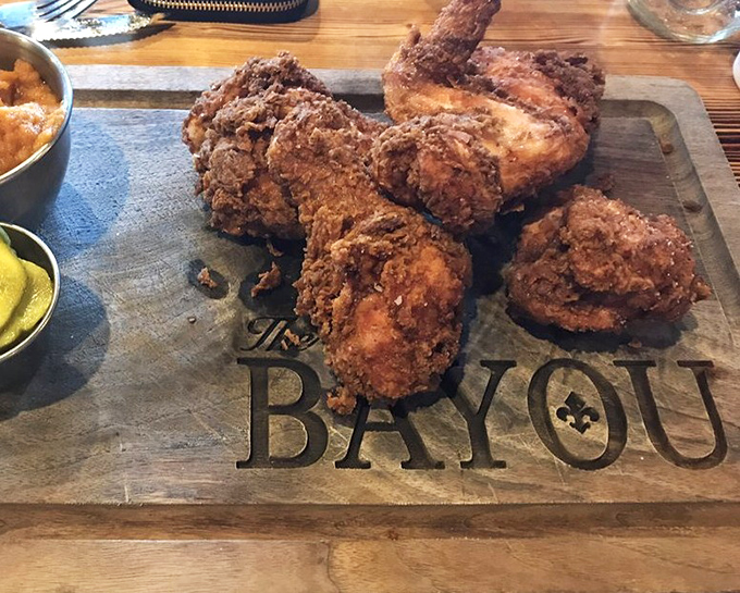 Golden-brown perfection that makes you want to high-five strangers. This fried chicken doesn't just speak Southern&mdash;it sings it with a full gospel choir.