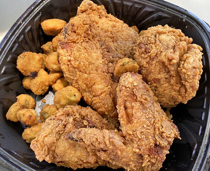 Golden-brown perfection that makes Colonel Sanders weep with envy. This fried chicken's crackling exterior gives way to juicy meat that'll haunt your dreams in the best possible way.